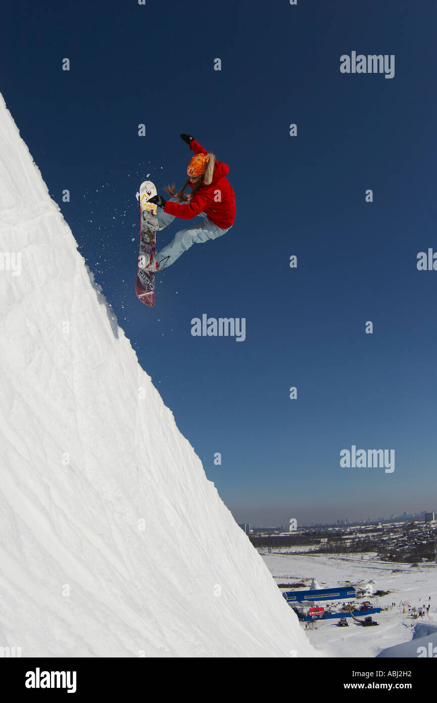 Snowboard girl and half pipe ride 3 Stock Photo - Alamy