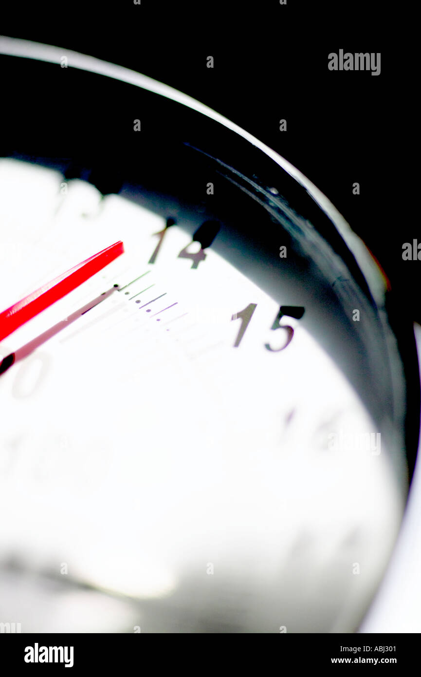 Needle pointing to weight on dial of weighing scale Stock Photo - Alamy