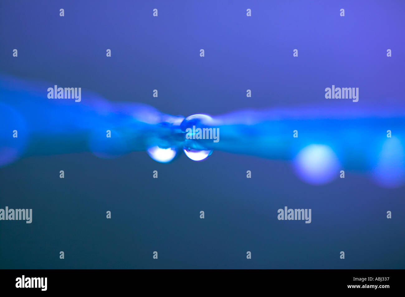 raindrops on washing line in rain Stock Photo - Alamy