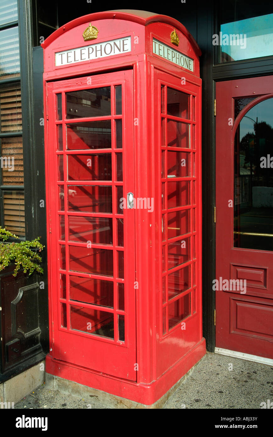 Iconic red phone booth in Victoria, Vancouver Island Stock Photo - Alamy