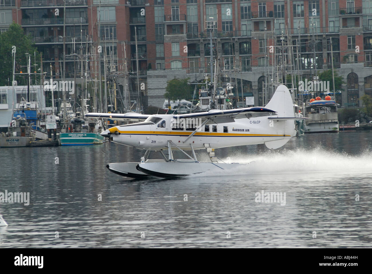 Seaplane taking off from Victoria harbour, Vancouver Island Stock Photo ...