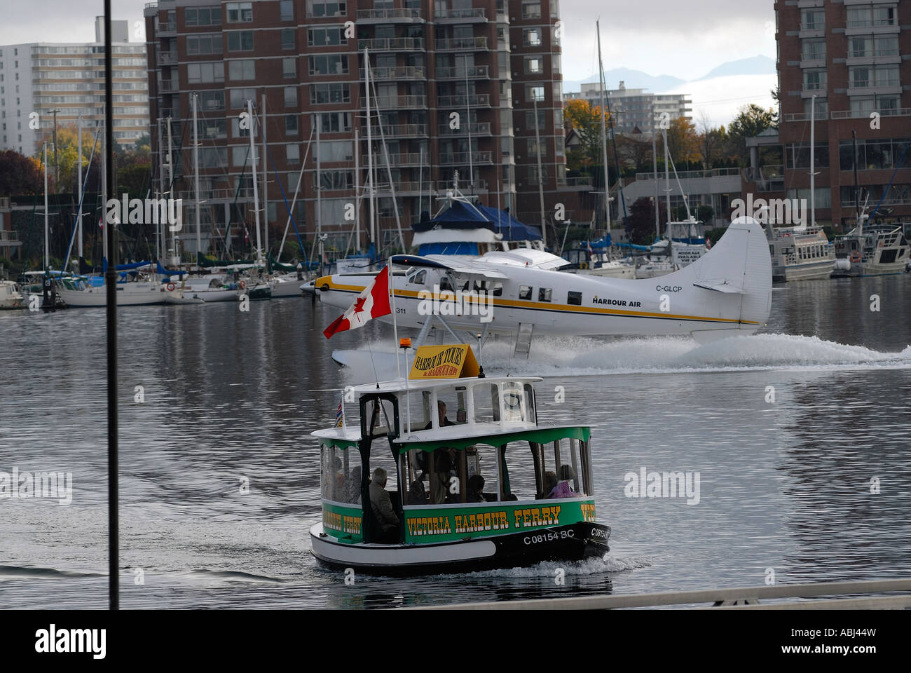 Seaplane taking off from Victoria harbour, Vancouver Island Stock Photo ...