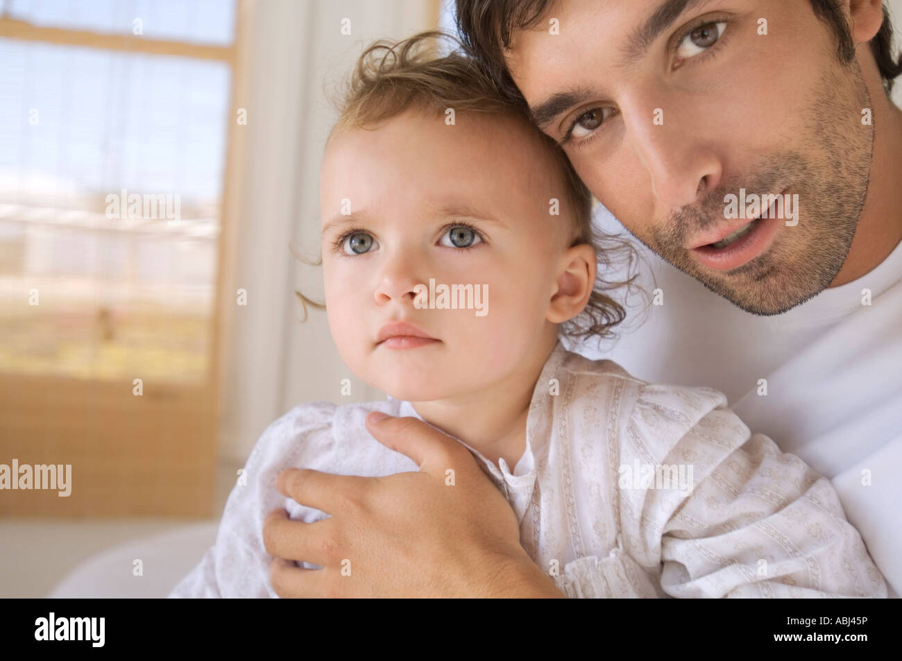 Portrait of man with little girl Stock Photo - Alamy