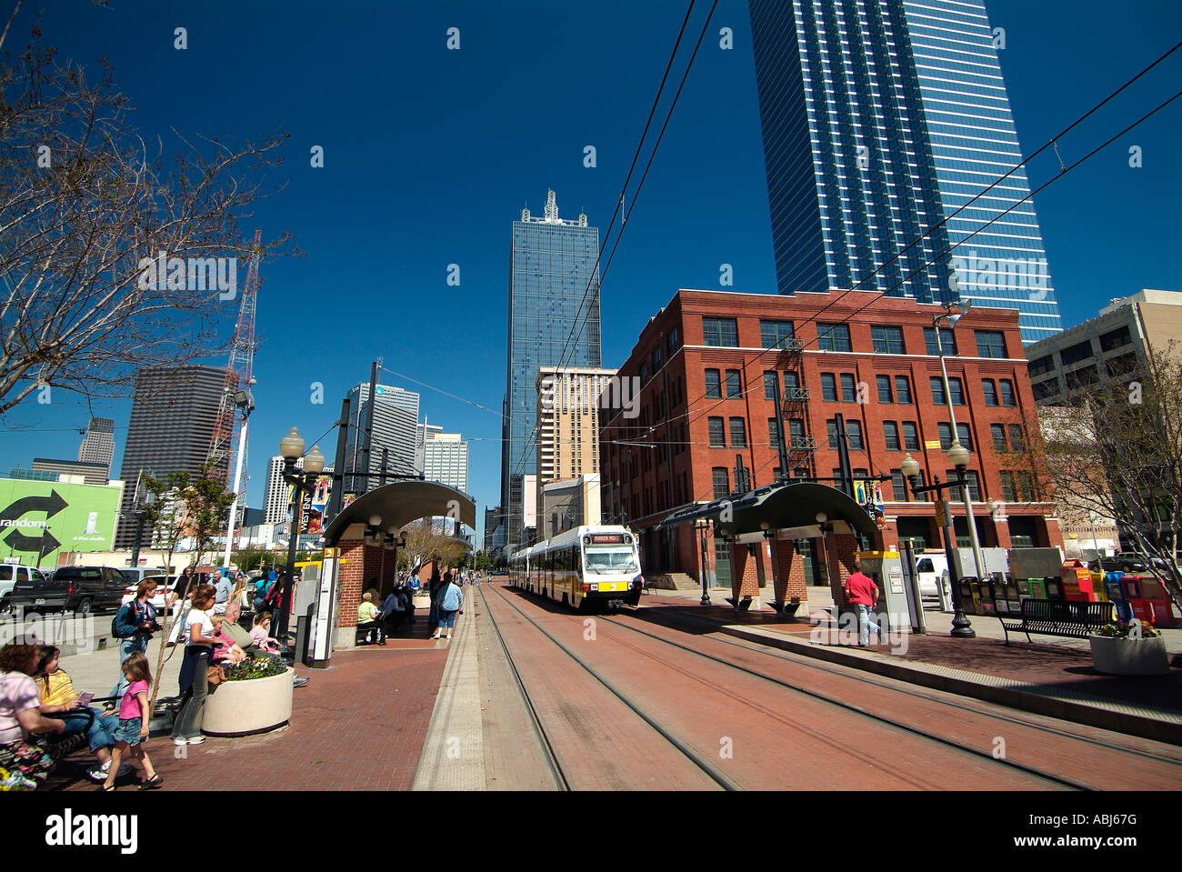 People waiting the subway shuttle in Dallas, Texas Stock Photo - Alamy