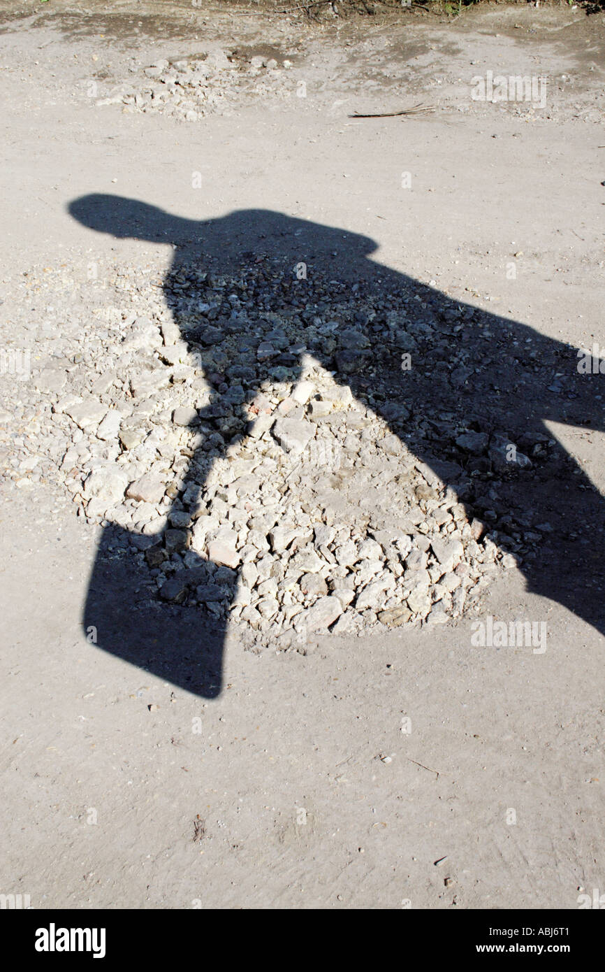 Shadow of a working man Stock Photo - Alamy
