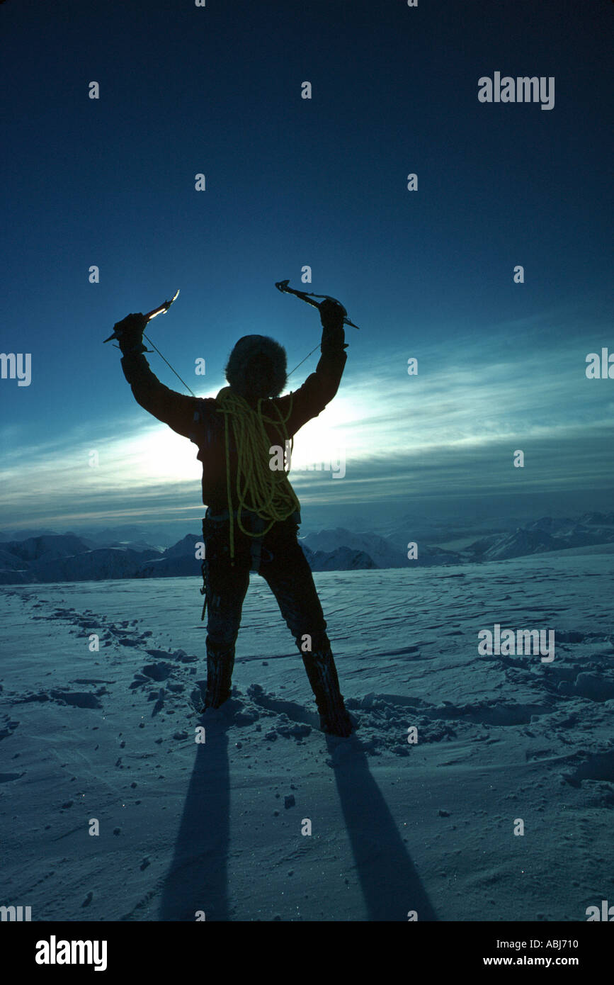 Mountain climber at the summit Stock Photo - Alamy