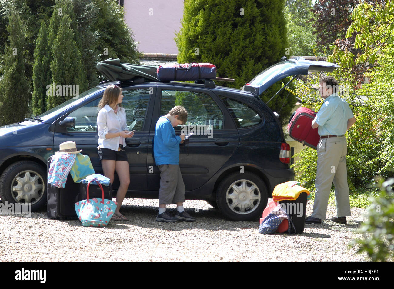packing to go on holiday Stock Photo - Alamy