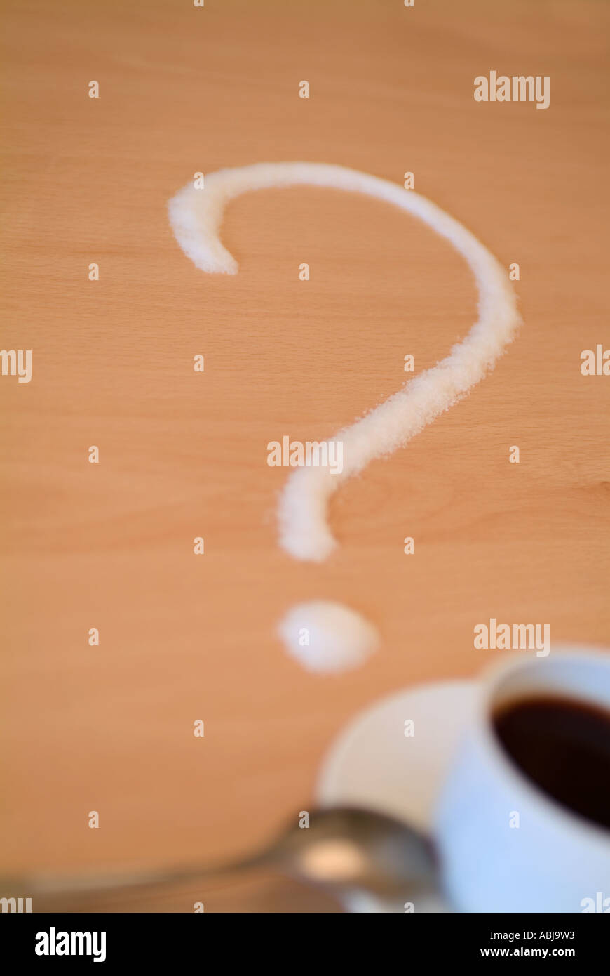 question mark of sugar with coffee cup on tabletop Stock Photo - Alamy