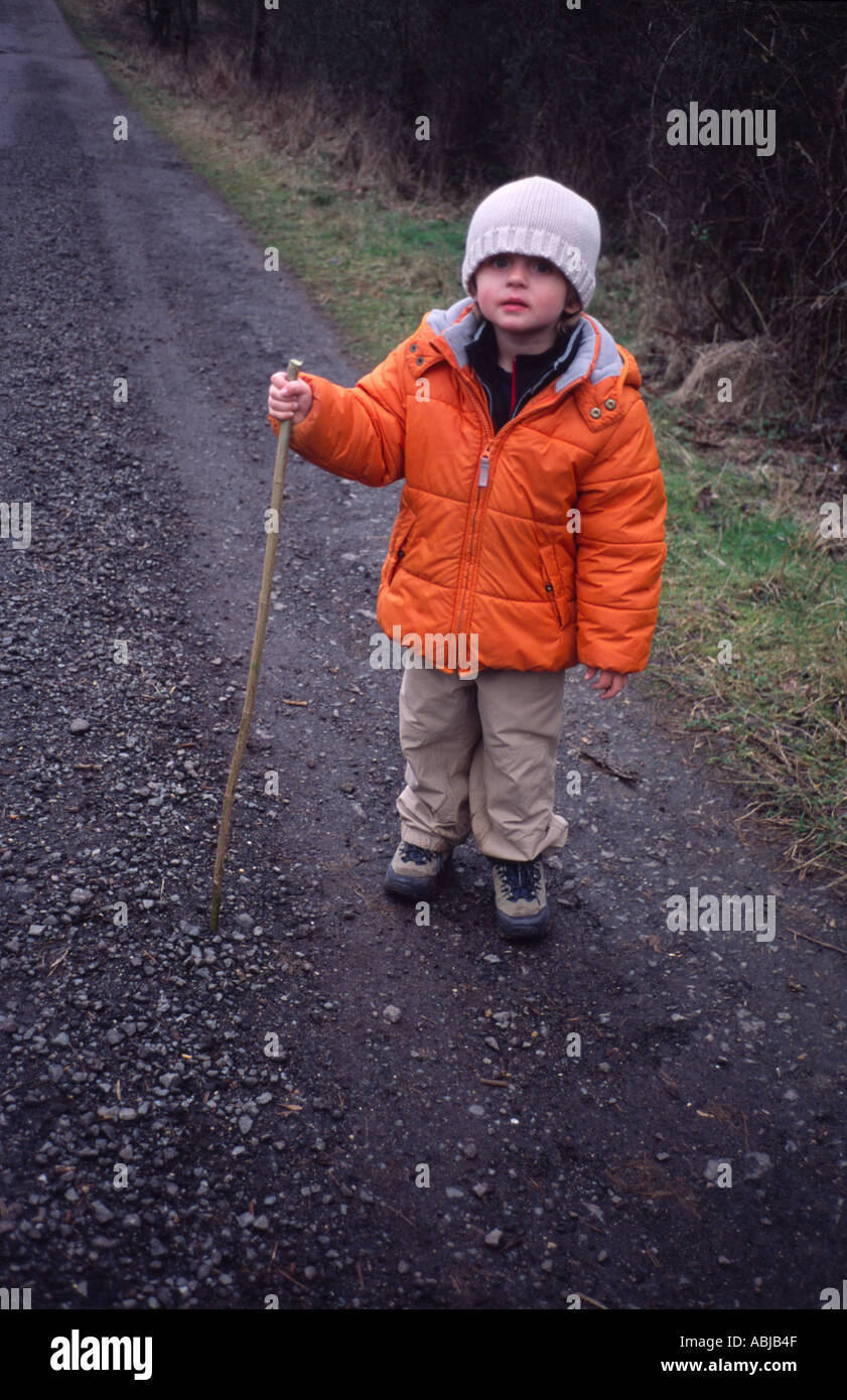 young child going for a winter walk all wrapped up against the cold ...