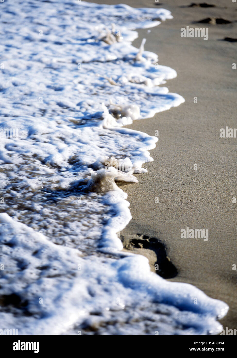 Sea washing away sand hi-res stock photography and images - Alamy