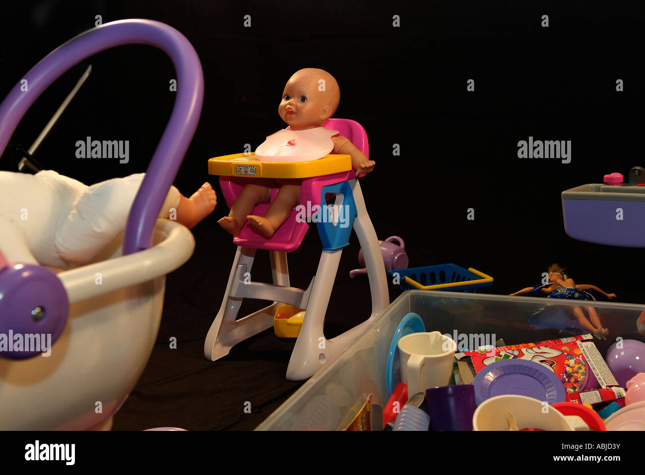 Box filling with plastic toys Stock Photo - Alamy