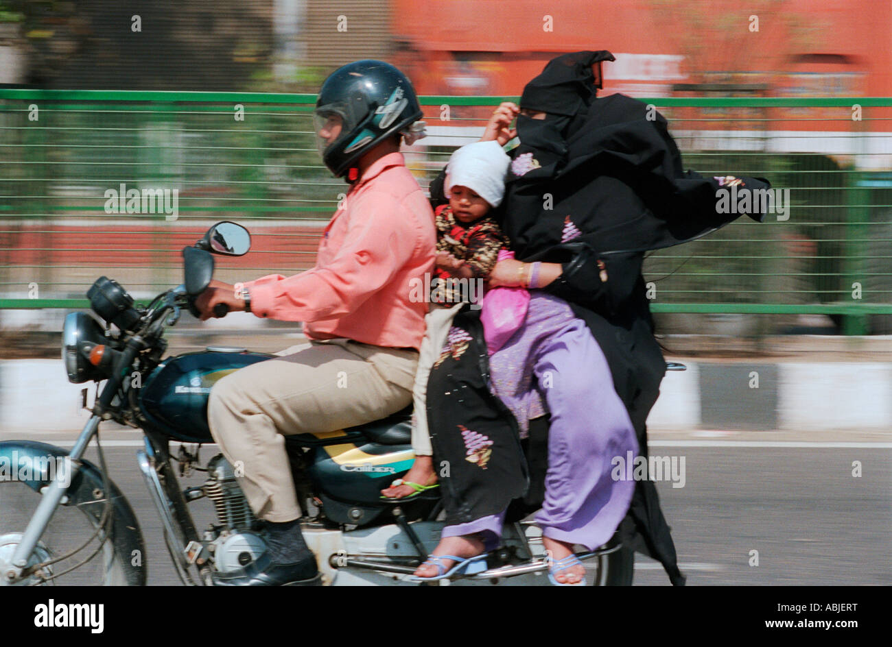 Indian family on motorbike in hi-res stock photography and images - Alamy