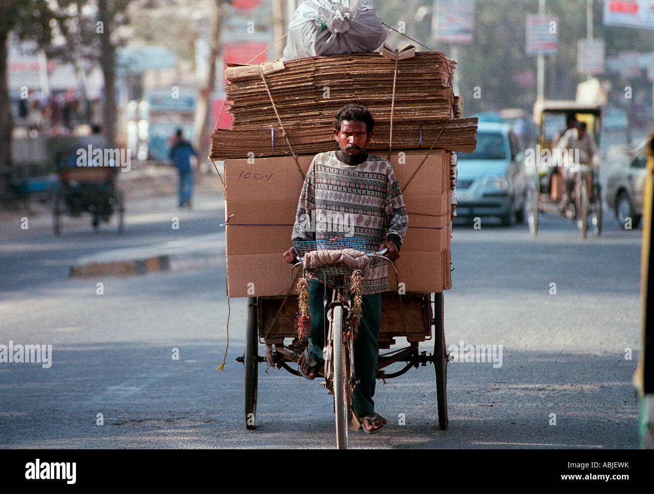 Heavily load cycle rickshaw in India Stock Photo - Alamy