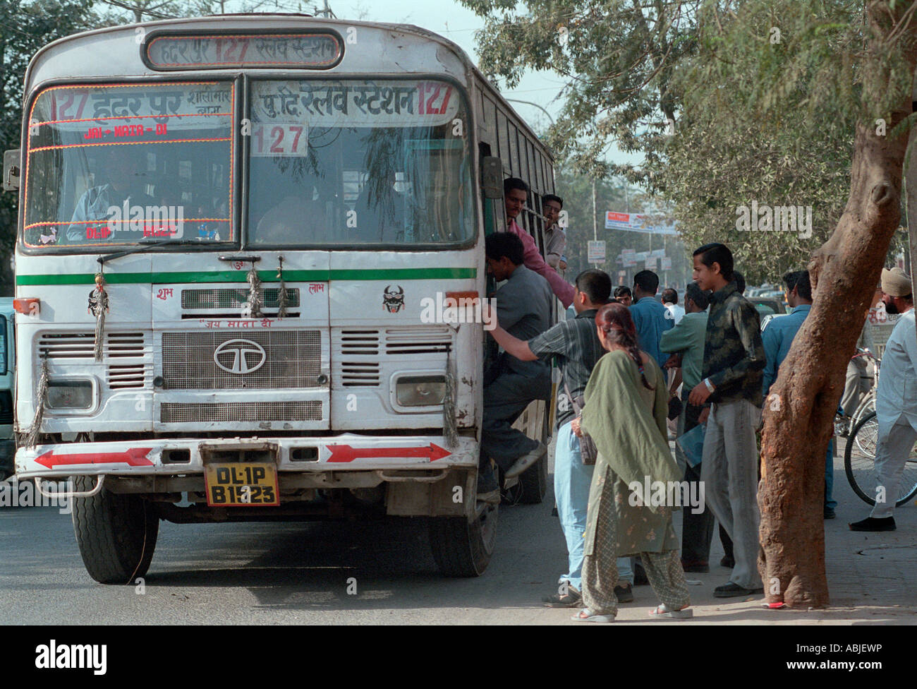 Boarding bus in India Stock Photo - Alamy