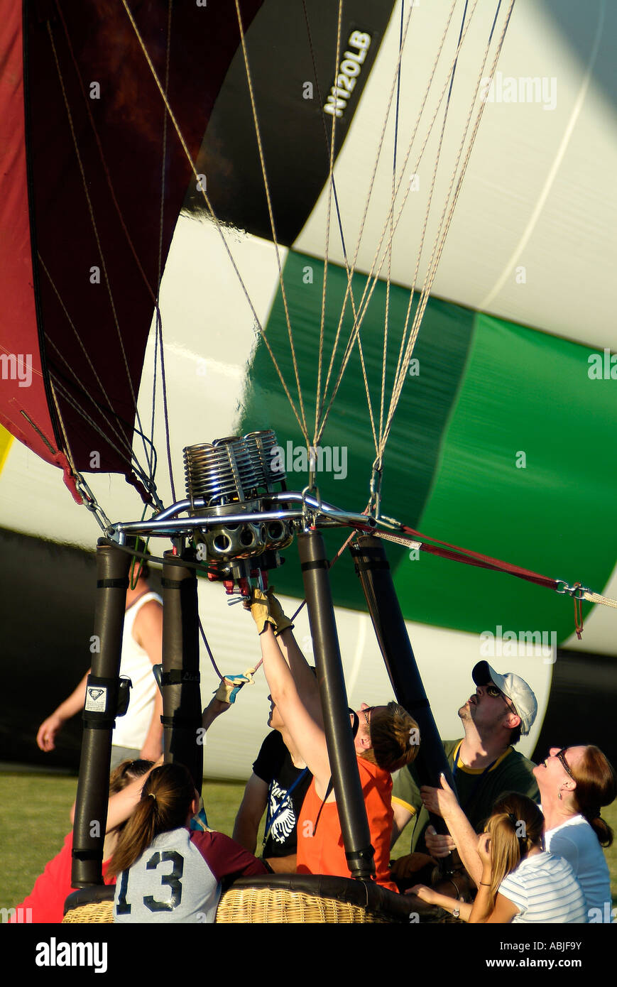 People inflating a balloon with hot air Stock Photo - Alamy