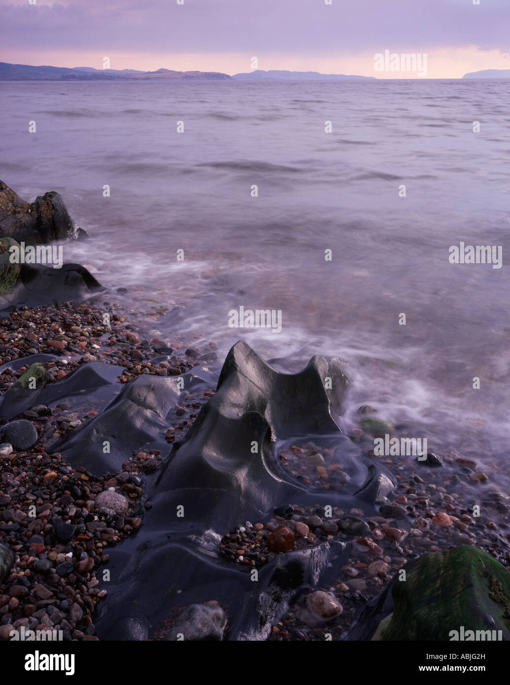 Shapely sea worn rock at Tralee Bay, Benderloch, near Oban, Argyll ...