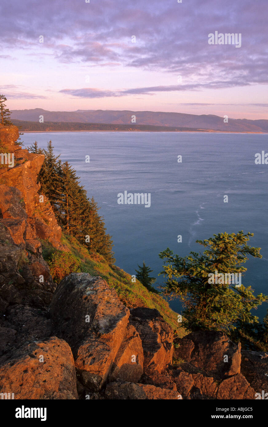 Sunset colors the rocky point of Cape Lookout State Park Oregon USA ...
