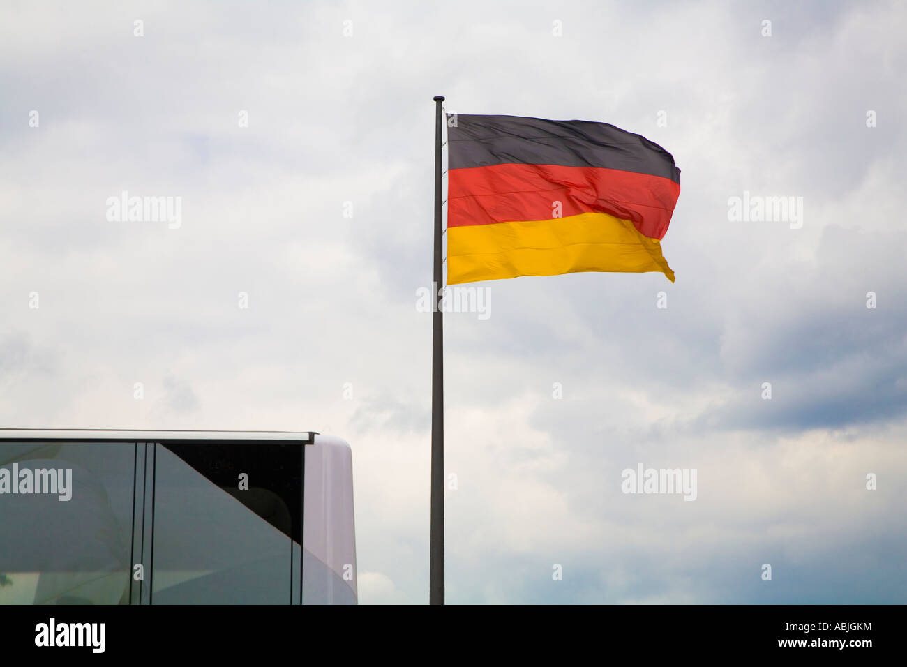 German Flag and Back of Bus Stock Photo - Alamy