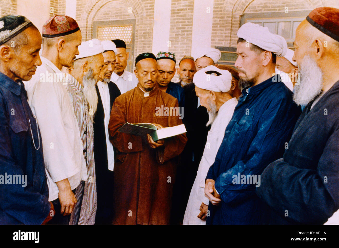 Uighur china reading hi-res stock photography and images - Alamy