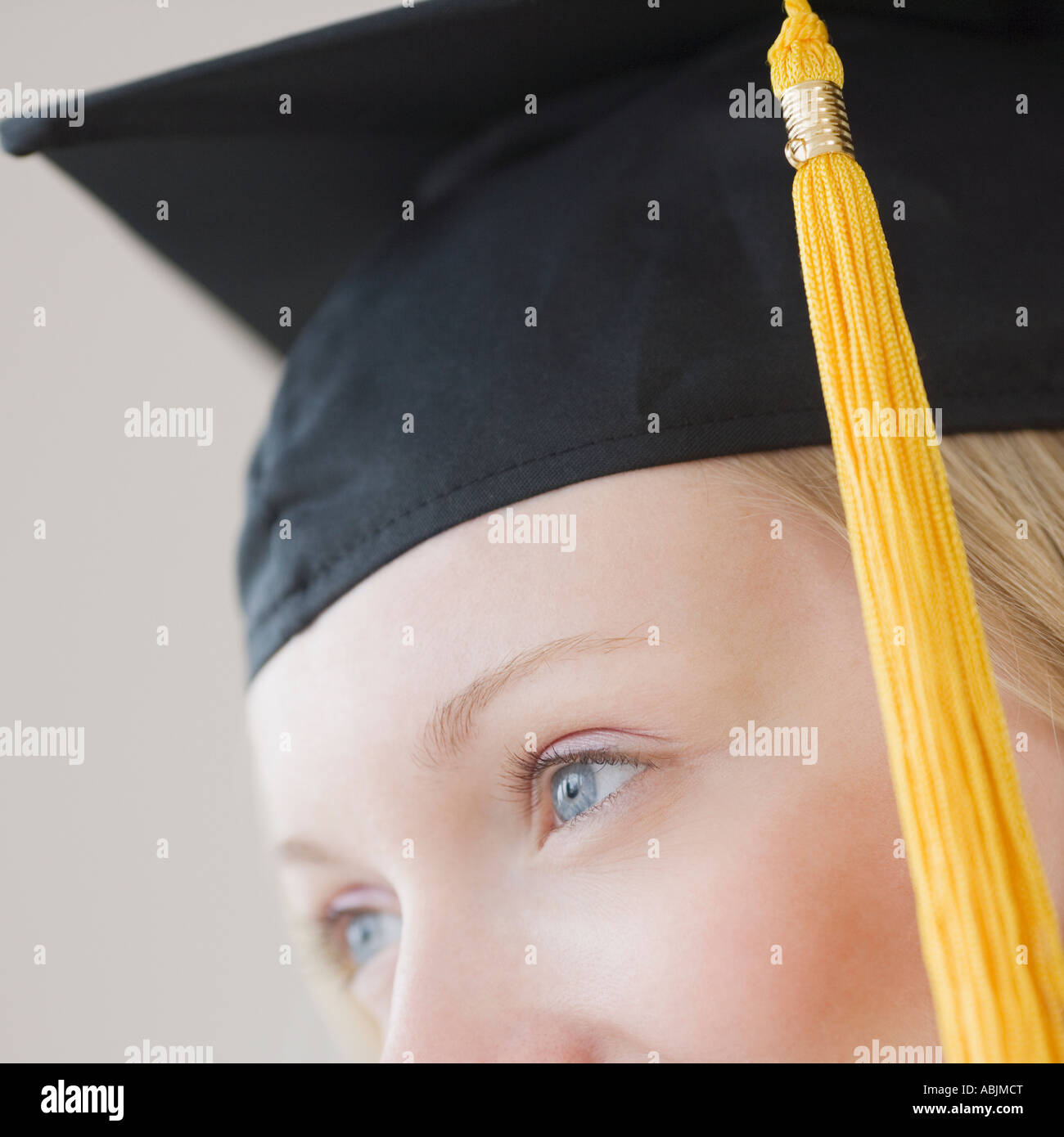 Close up of woman wearing graduation cap Stock Photo - Alamy