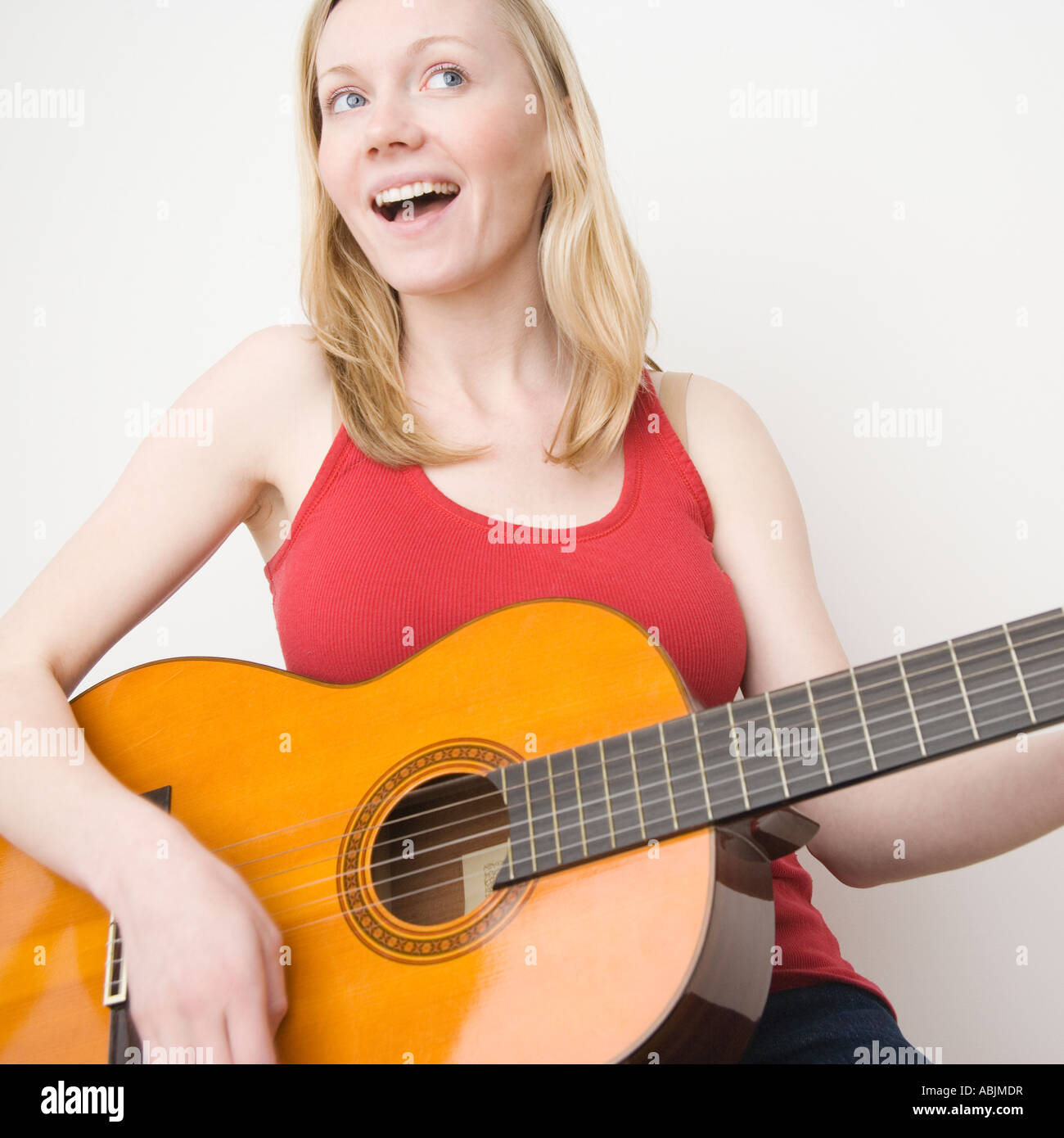 Paying guitar hi-res stock photography and images - Alamy