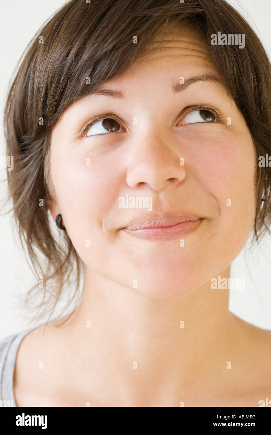 Close up of woman looking up Stock Photo - Alamy