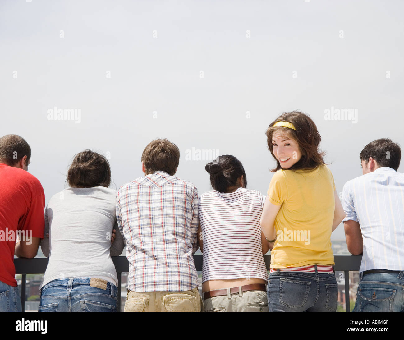 Group people looking over railing hi-res stock photography and images ...