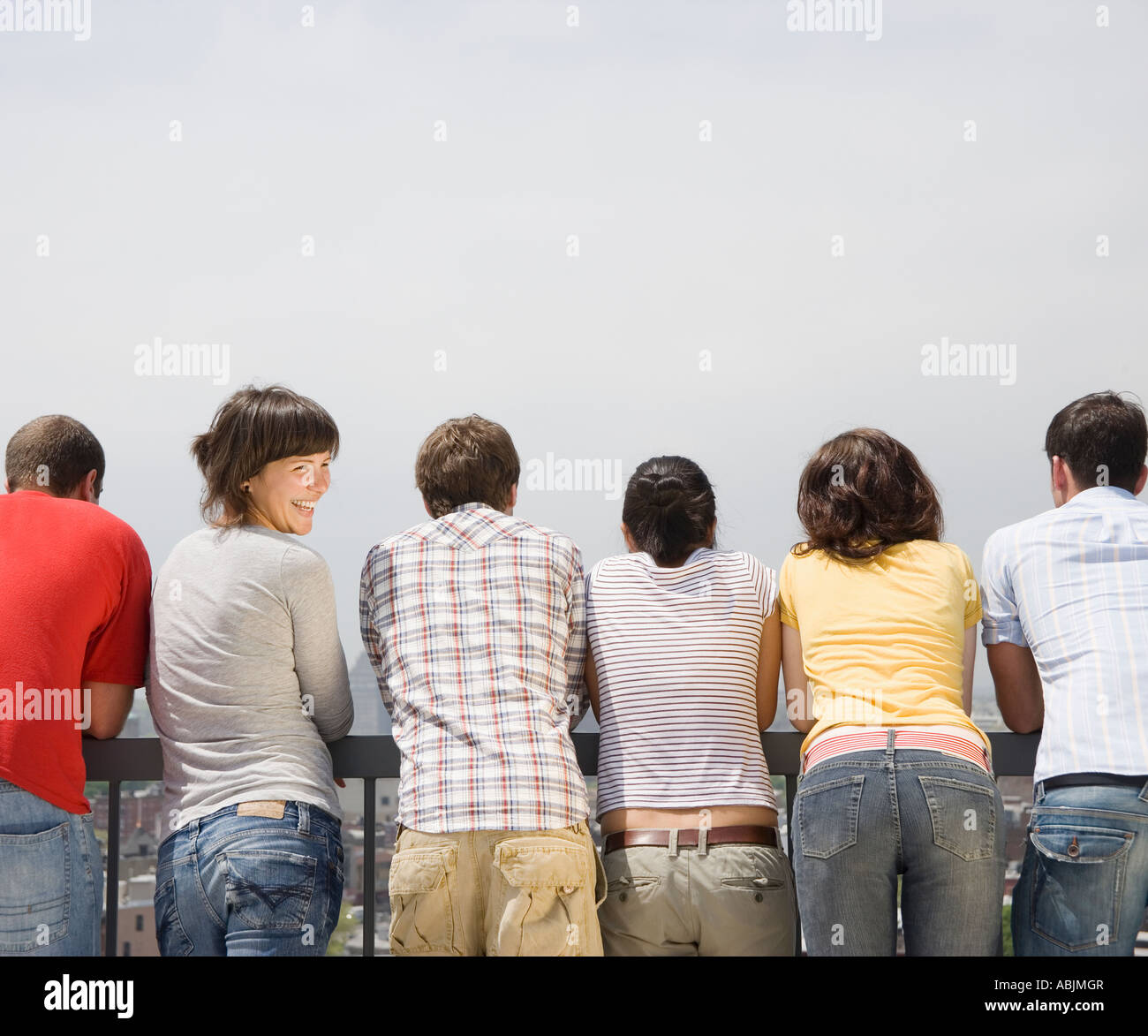 Group people looking over railing hi-res stock photography and images ...