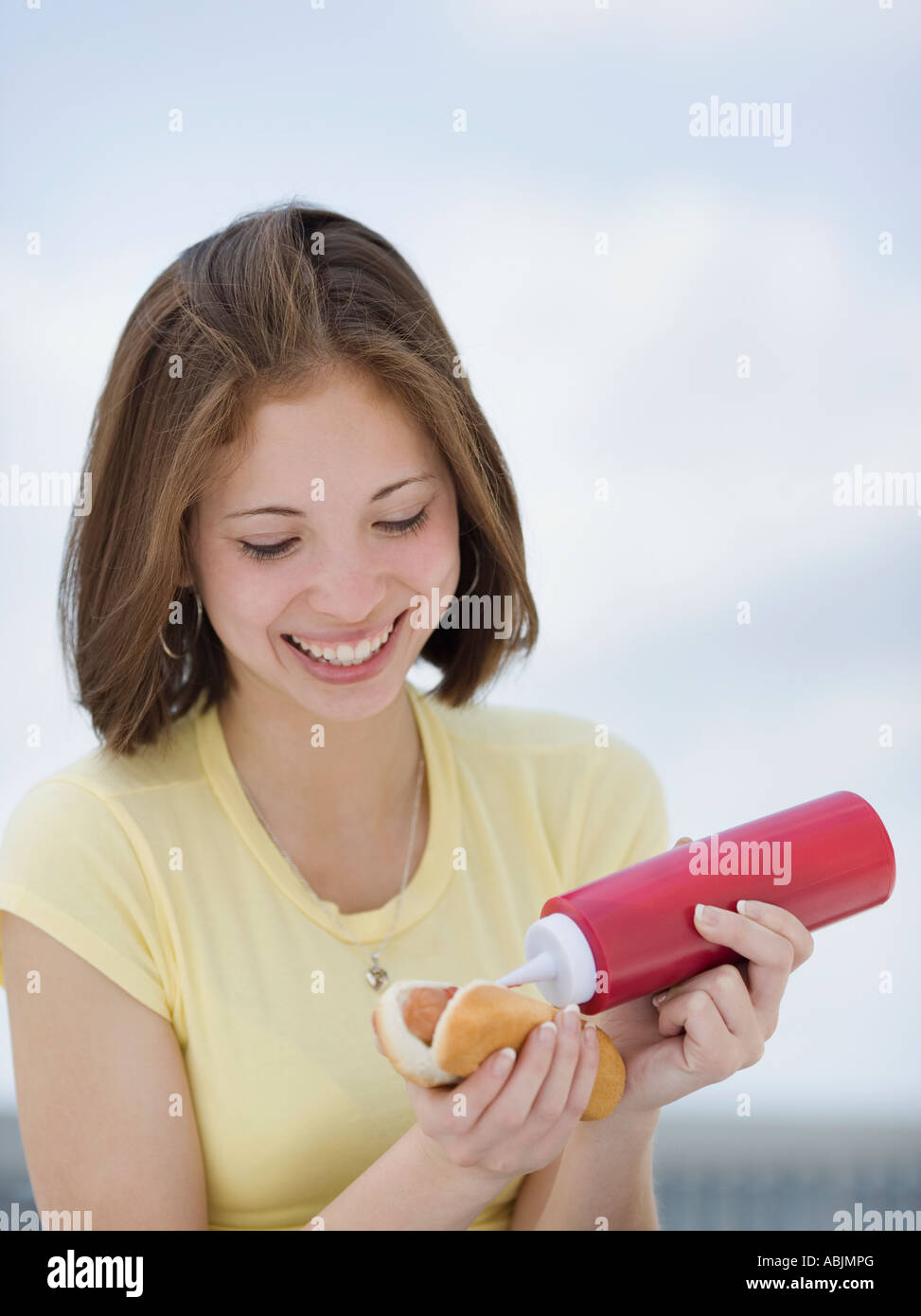 Girl putting ketchup hi-res stock photography and images - Alamy