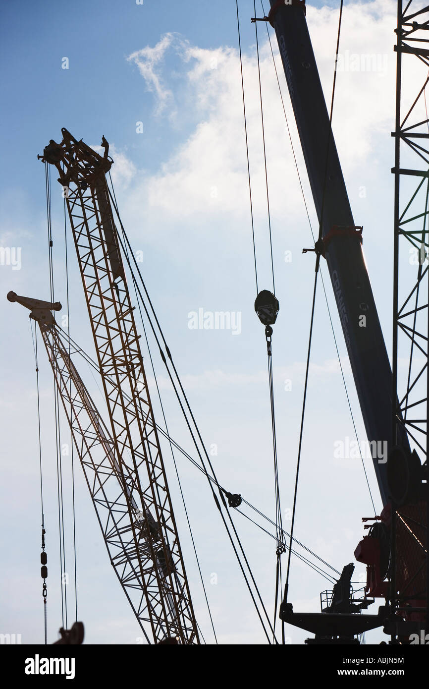 Low angle view of cranes Stock Photo - Alamy