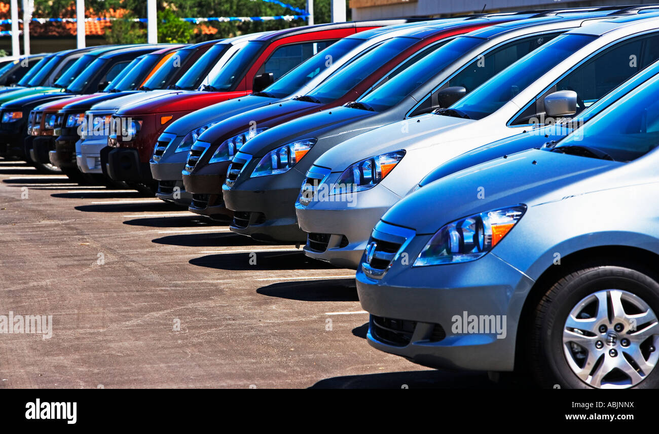 Row of new cars on lot Stock Photo - Alamy