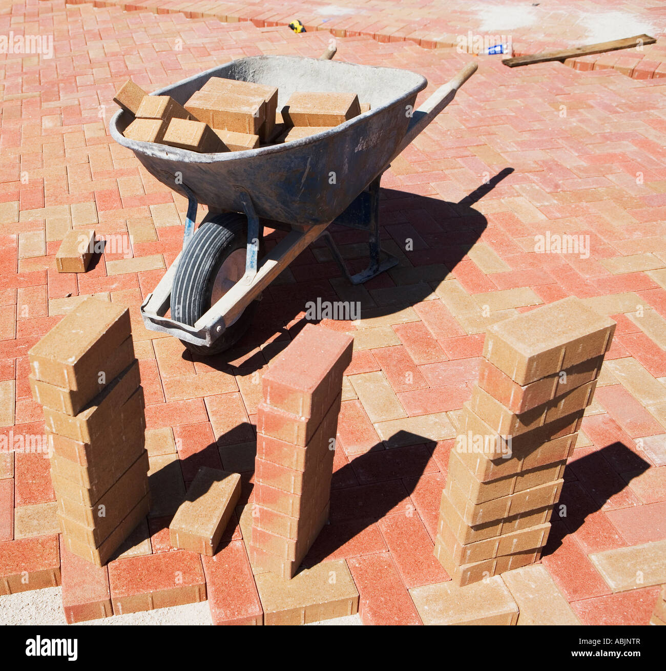Wheelbarrow bricks on new patio hi-res stock photography and images - Alamy