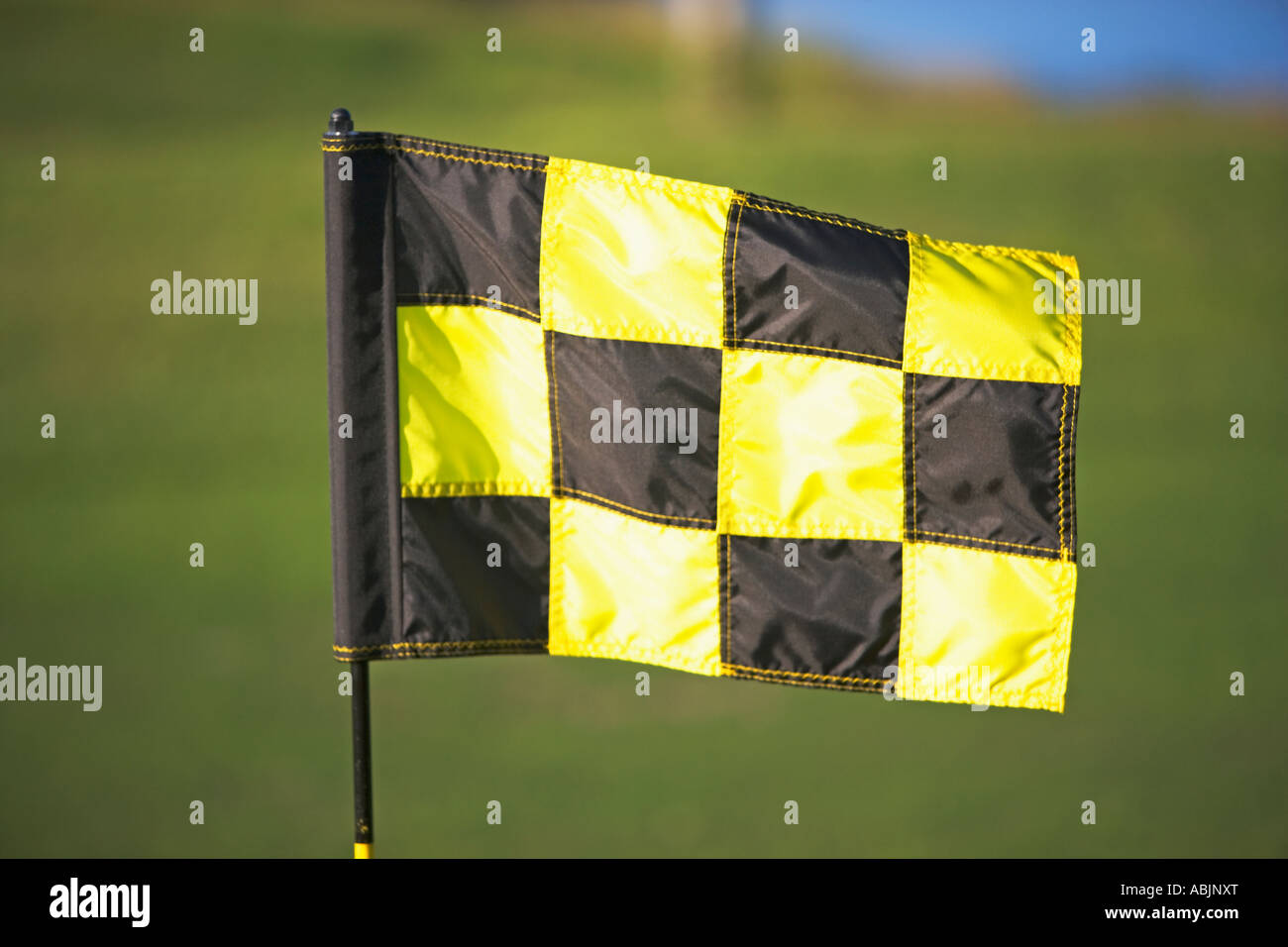 Black and yellow checkered flag Stock Photo - Alamy