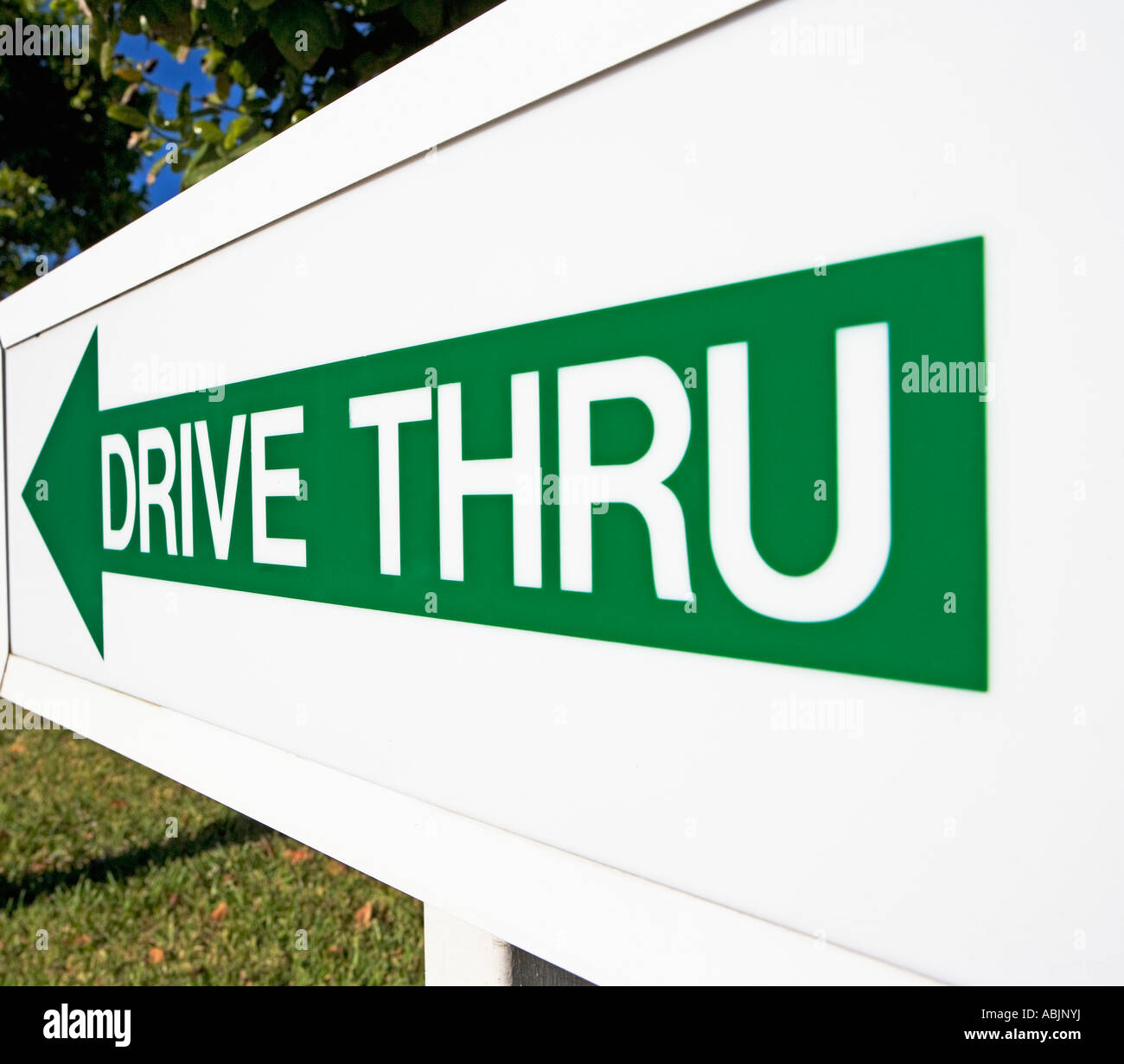 Sign pointing towards Drive Thru Stock Photo - Alamy