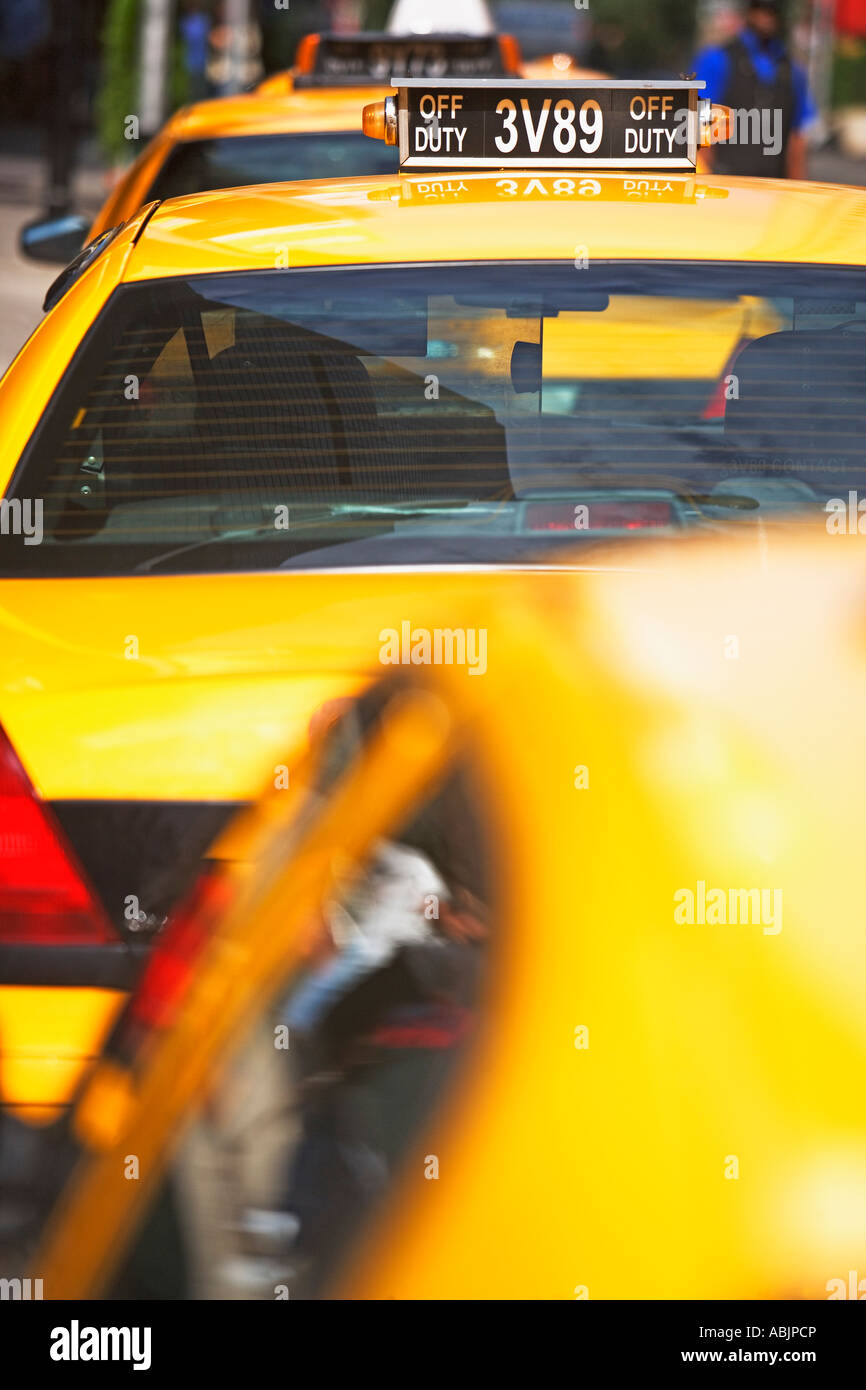 Taxi cabs parked in line Stock Photo - Alamy