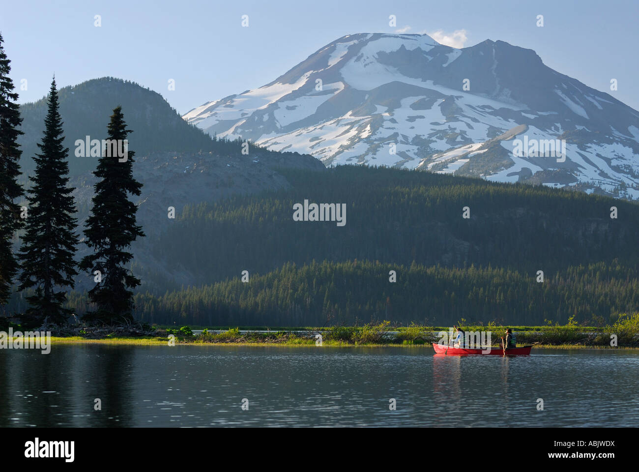 Pair of canoers on Sparks Lake in Spring Deschute National Forest ...