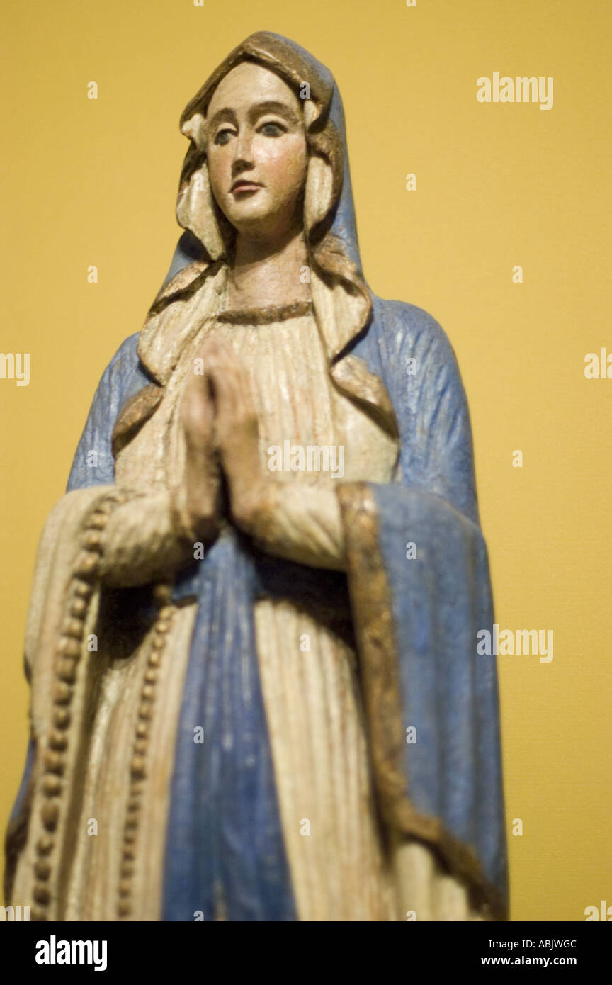 Traditional Polish Roman Catholic statue of Virgin Mary praying with a ...