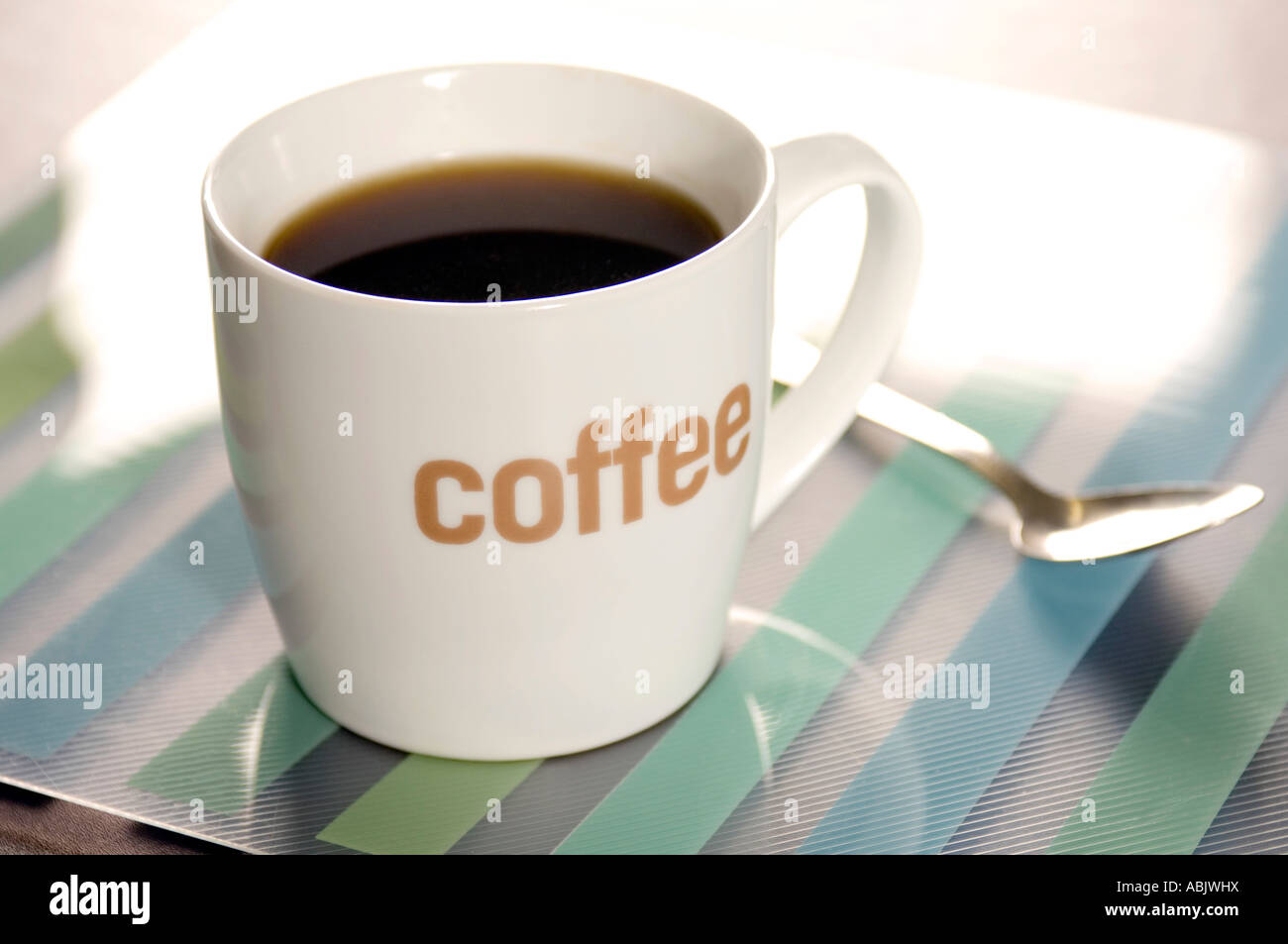 a cup of coffee in a cafe Stock Photo - Alamy