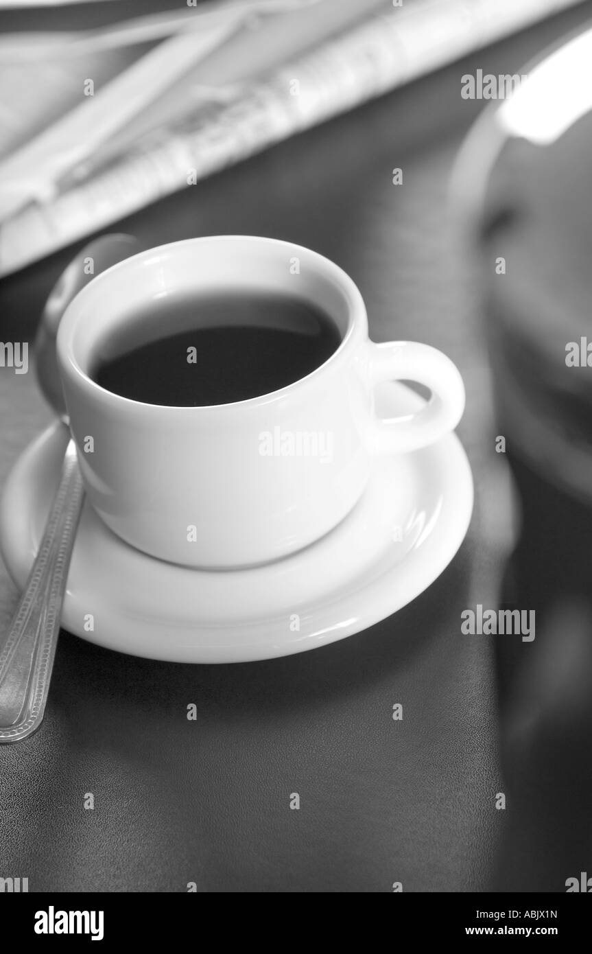 a cup of espresso coffee in a cafe Stock Photo - Alamy