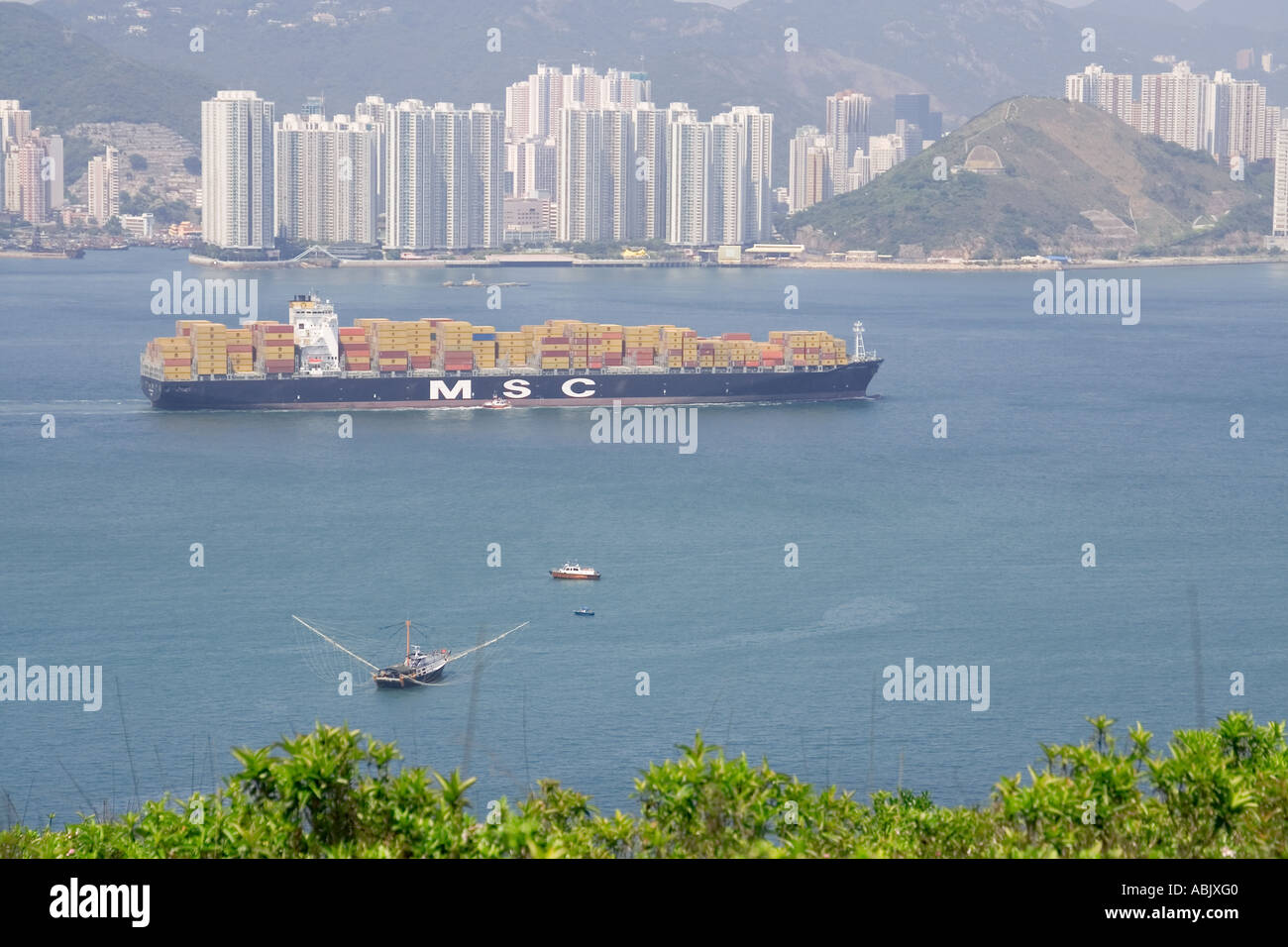 Massive Container ship clears Lamma Chanel heading out to sea fishing ...