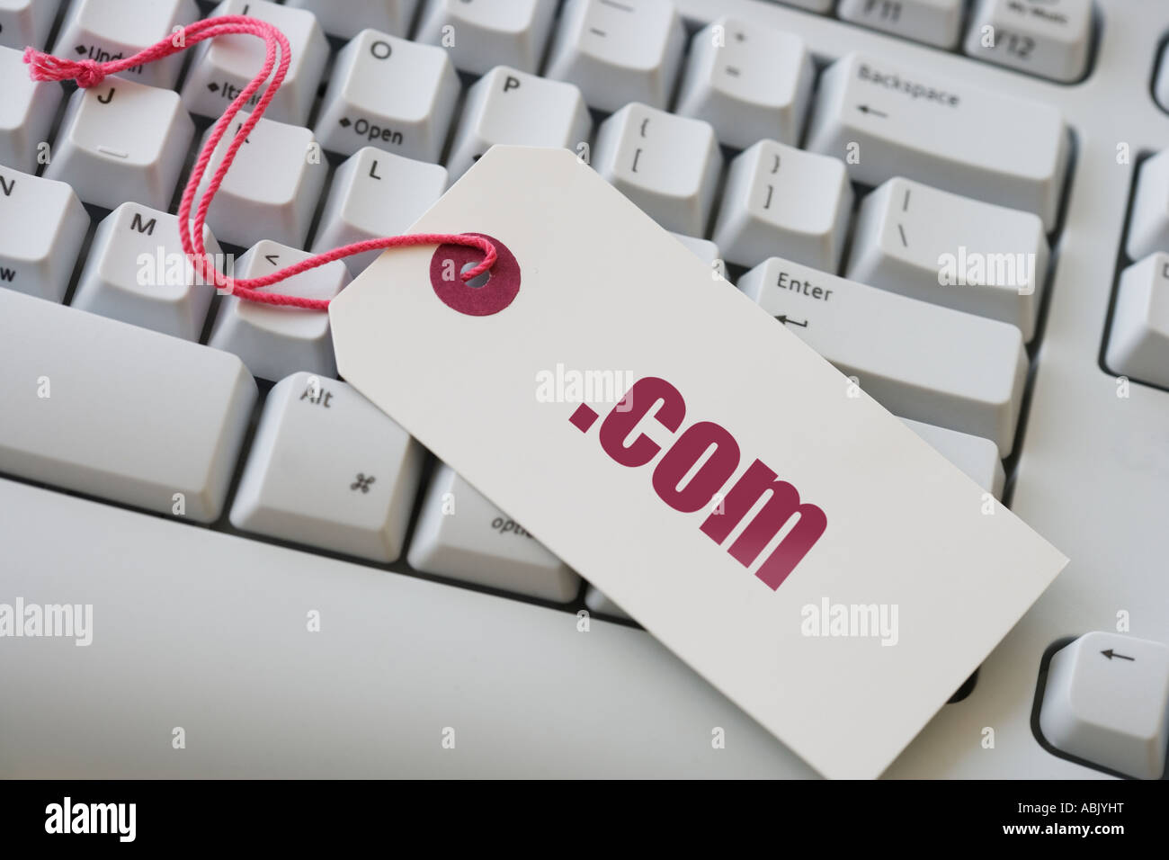 Computer keyboard with com tag Stock Photo - Alamy