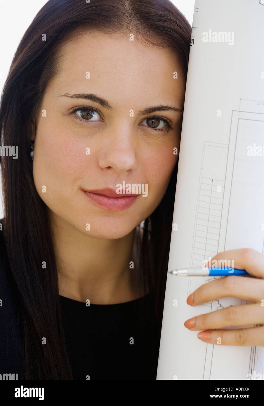 Female architect holding blueprints Stock Photo - Alamy Female architect holding blueprints Stock Photo - Alamy