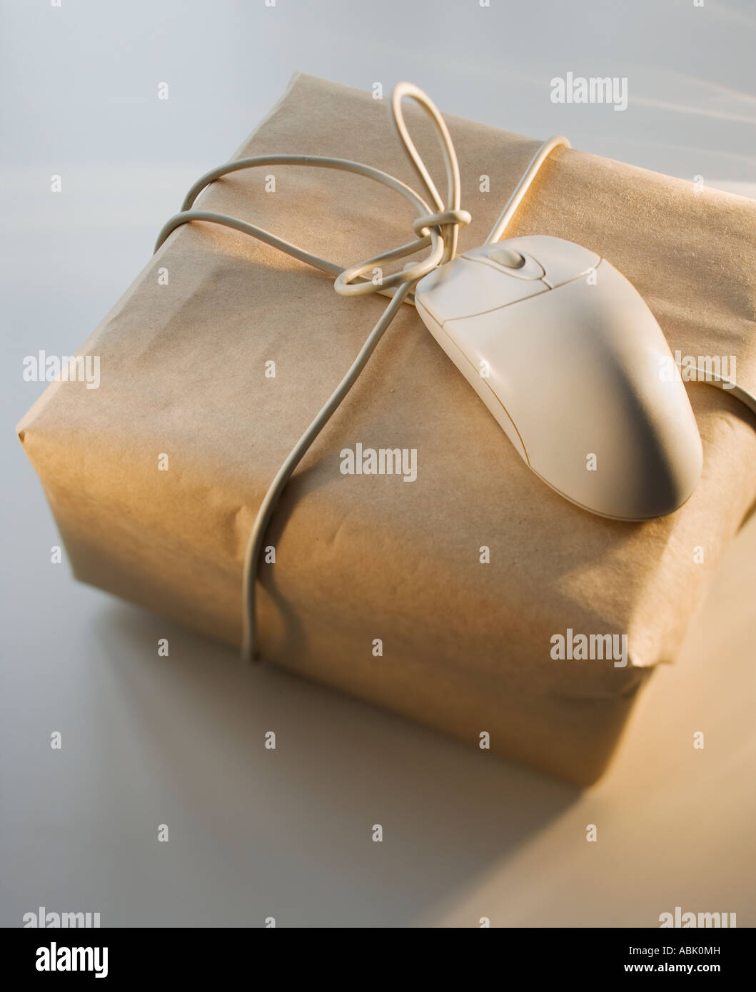 Close up of package and computer mouse Stock Photo - Alamy