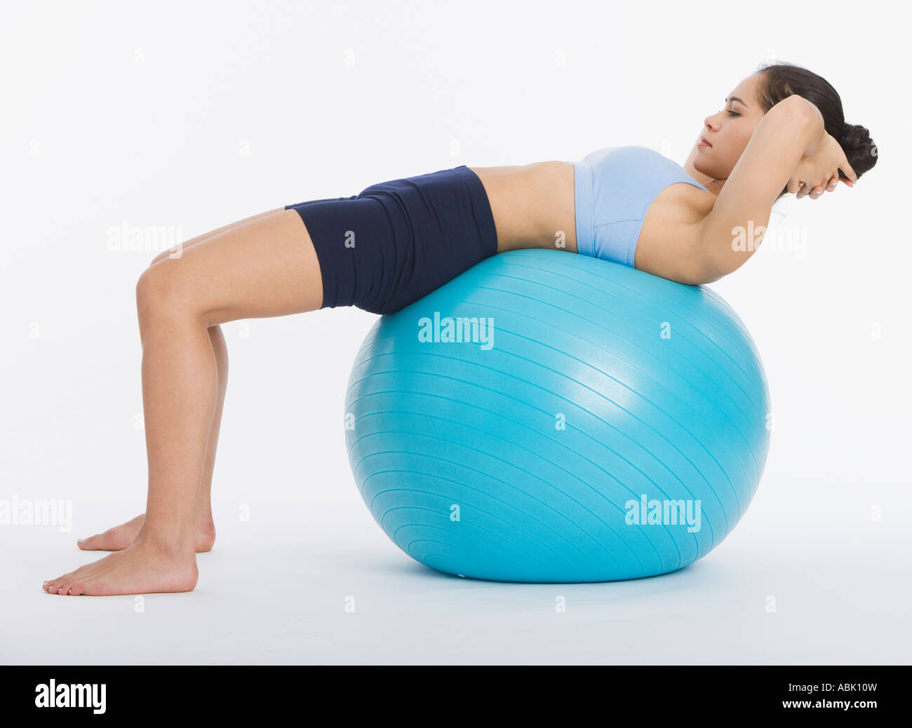 Hispanic female doing stretching hi-res stock photography and images ...