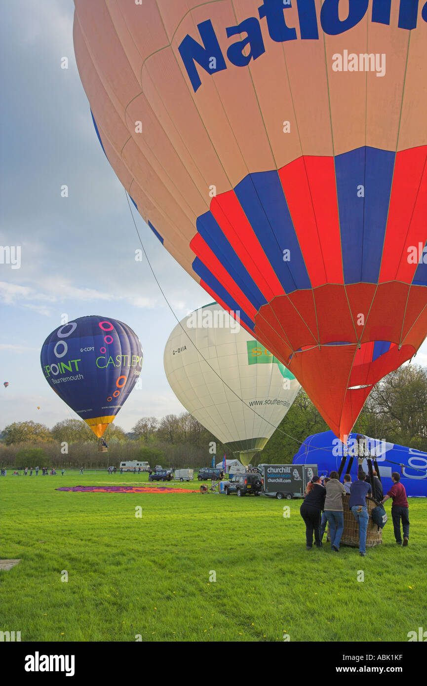 Hot Air balloons lifting off at a Surrey event Stock Photo - Alamy