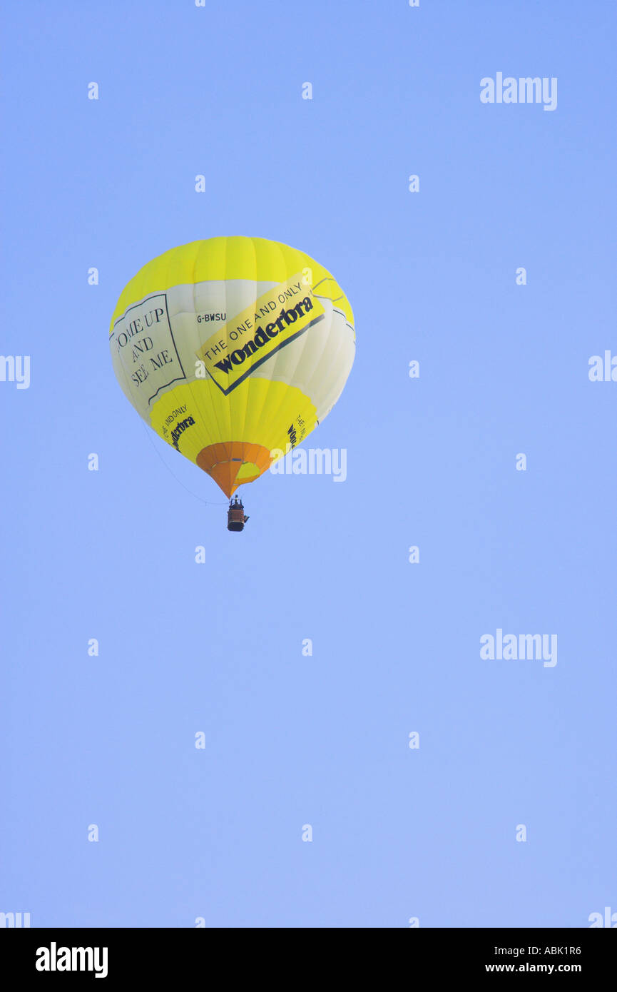 yellow hot air balloon with wonderbra advertisement Stock Photo - Alamy