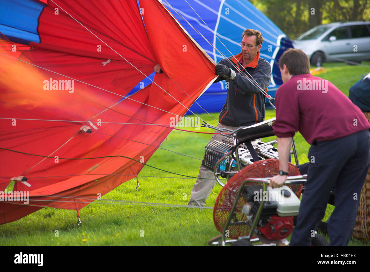 Burner plume and blower fan inflating hot air balloon Stock Photo - Alamy