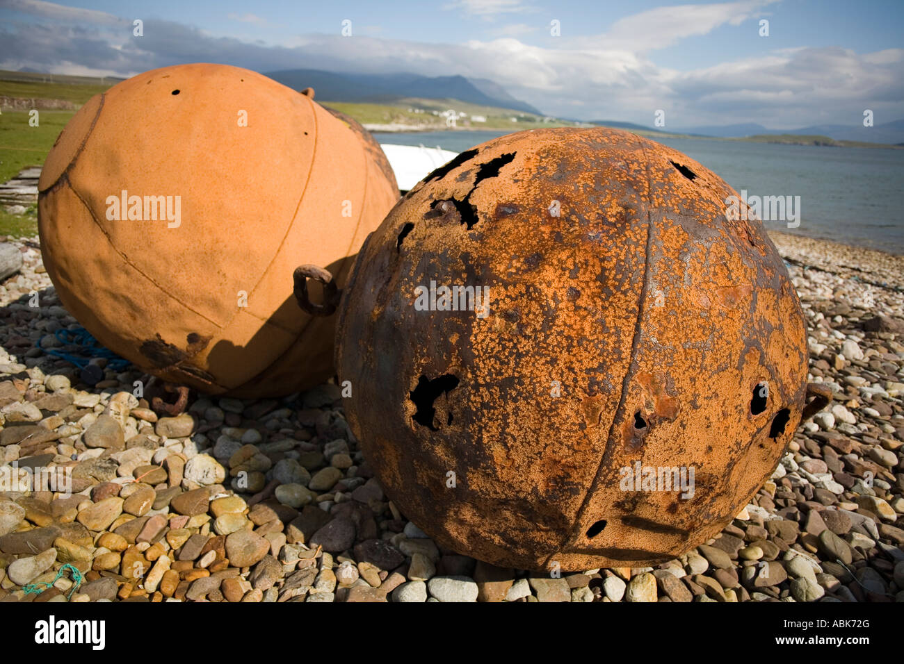 Pair of Rusty Old Buoys Stock Photo - Alamy