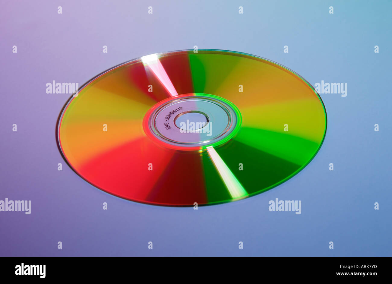 A colorful CD/DVD on a plain background Stock Photo - Alamy
