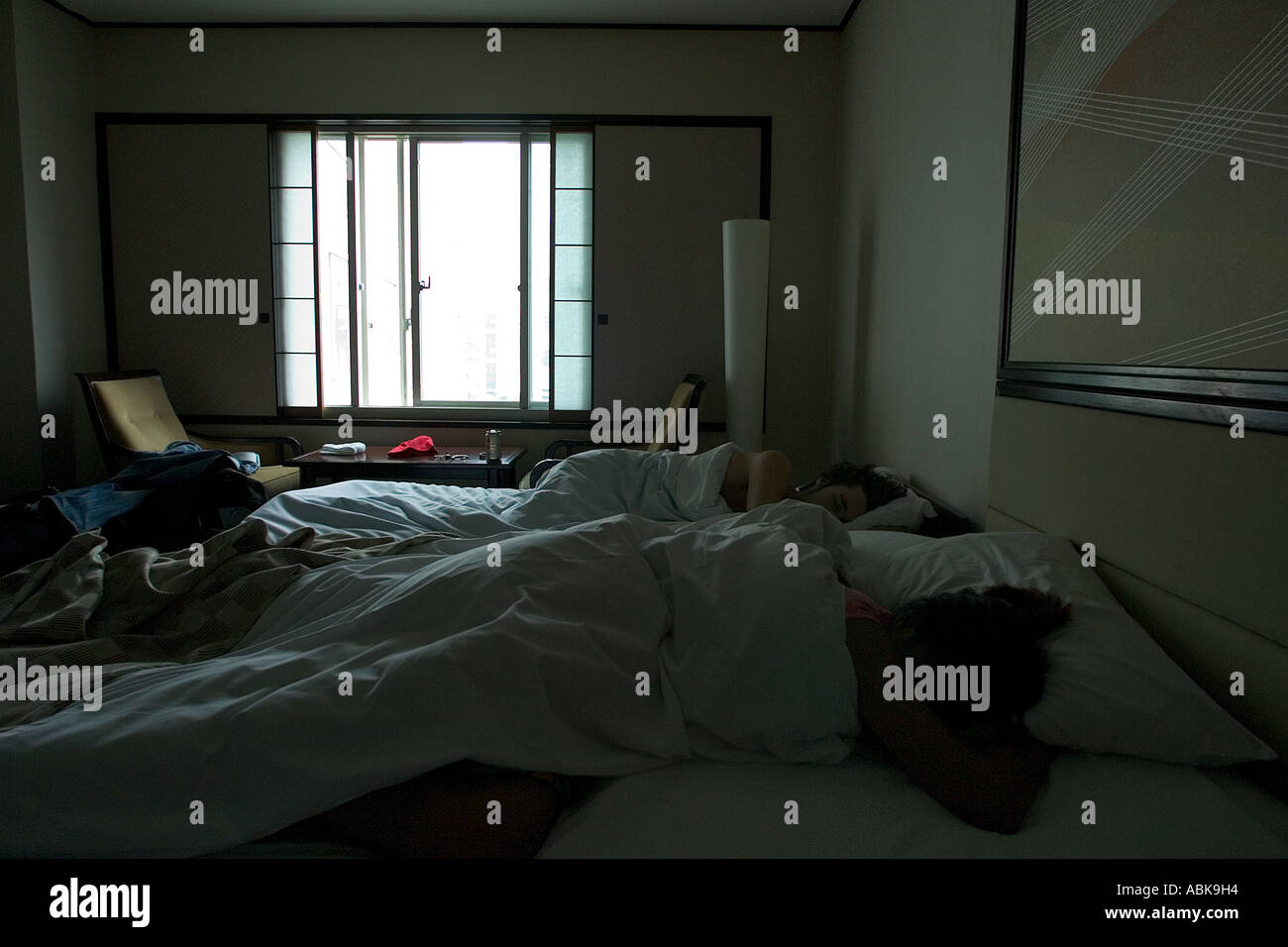 sleeping in hotel room Stock Photo - Alamy
